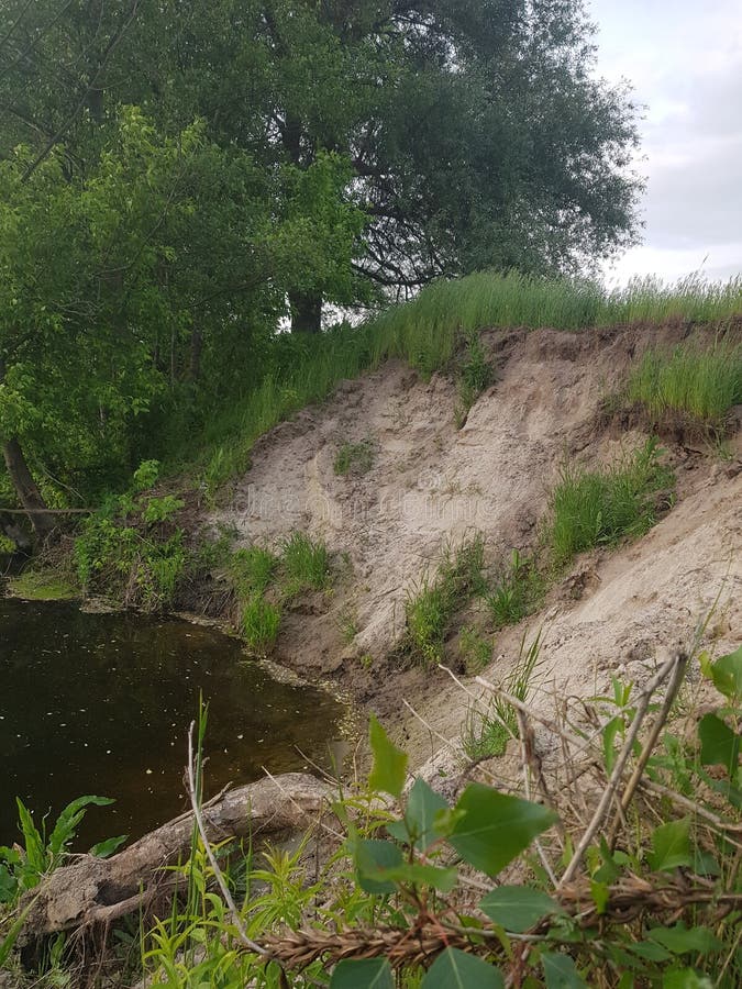 Steep River Bank without Grass Stock Photo - Image of river, steep ...