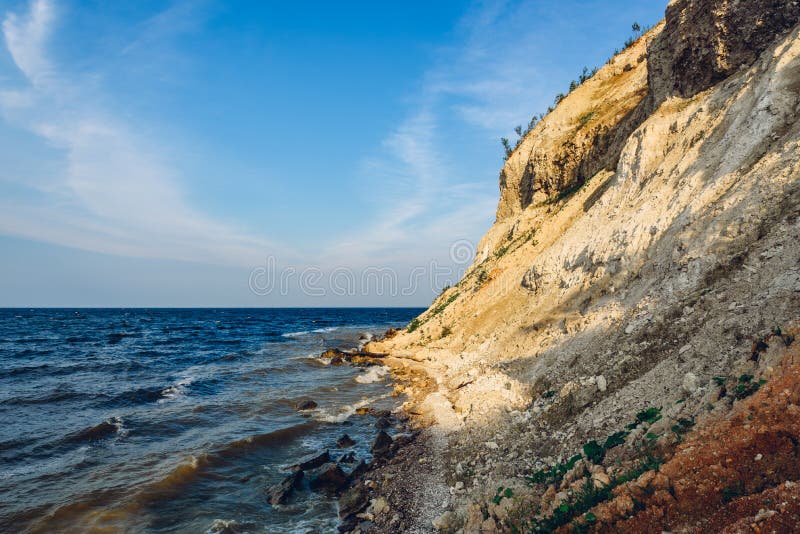 Steep rocky river shore stock photo. Image of nature - 143532150