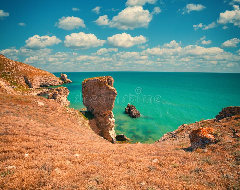 Steep rocky sea coast stock image. Image of color, morning - 69607195
