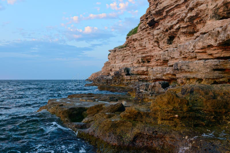 Steep Rocky Seashore at Sunset Stock Image - Image of rocks, view ...