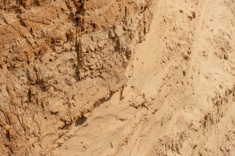 The Steep Slope of a Sand Mining Quarry. Background and Texture of Sand ...