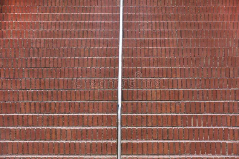 Steep Staircase and Metalic Handrail. Geometric Bricks Structure ...