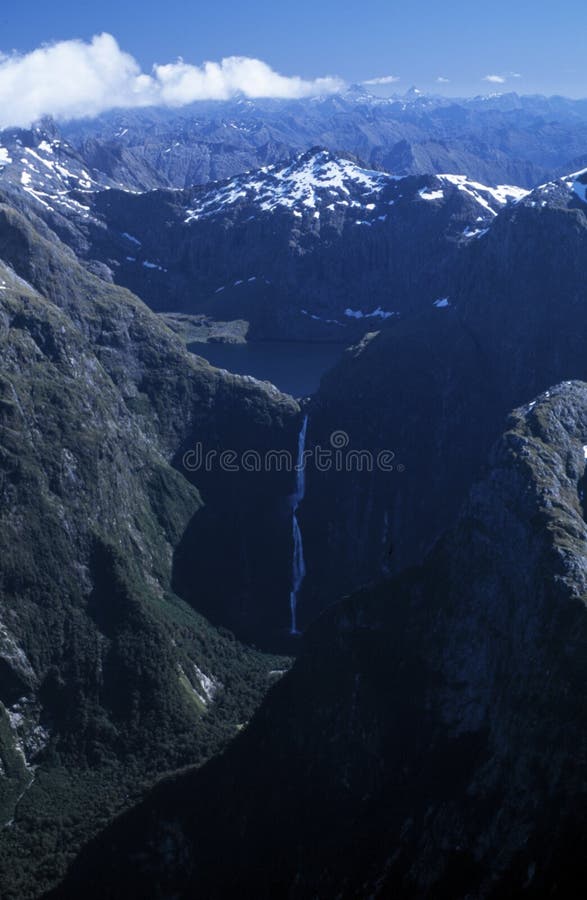 Steep Waterfall Across the Valley Stock Photo - Image of drop, falls ...