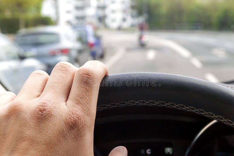 Steerind Wheel with Driver Hand on it in Modern Car Interior Wit Stock ...