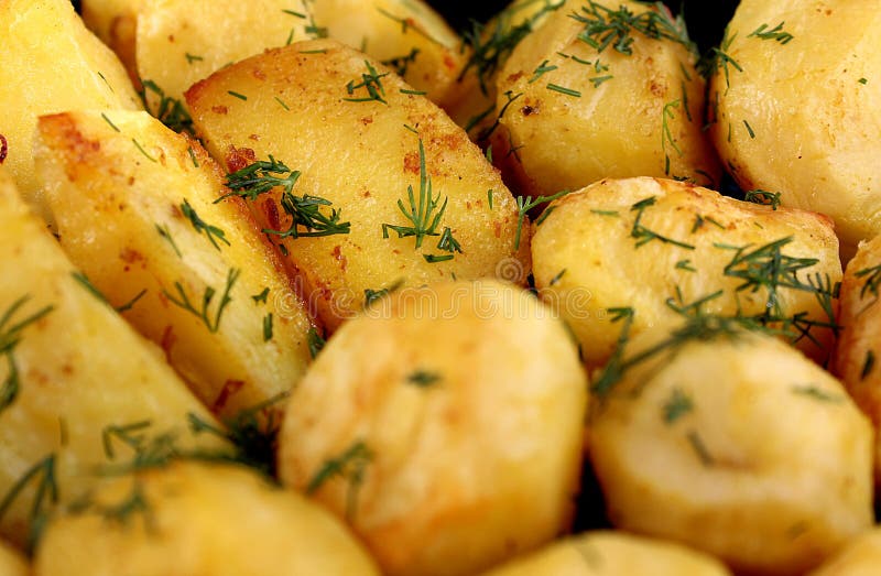 Stekte Potatisar Bakade I En Ugn Med Kryddor Arkivfoto - Bild av ...