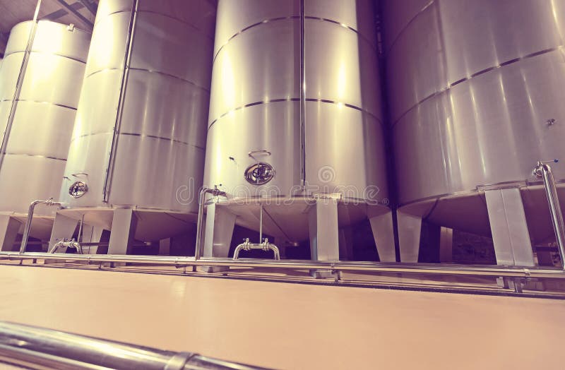 Stell barrels in winery stock photo. Image of group, metal - 92534780