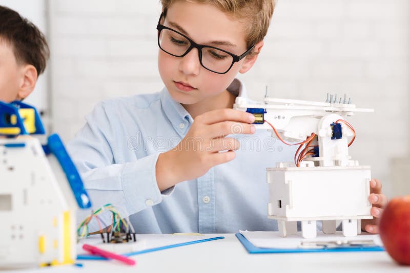 Stem Education. Boy Testing His New Robotic Device Stock Photo - Image ...