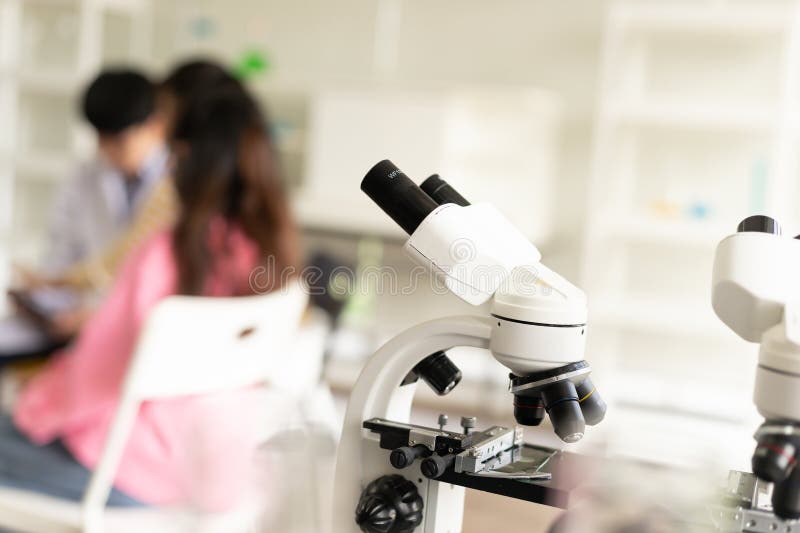 STEM Education Concept. Asian Children in Laboratory Research an ...