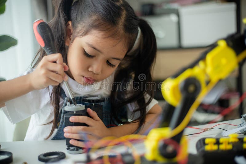 STEM Education Concept. Asian Young Girl Learning Robot Design Stock ...