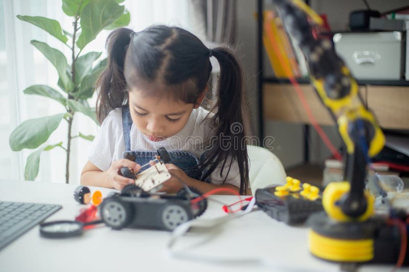 STEM Education Concept. Asian Young Girl Learning Robot Design Stock ...