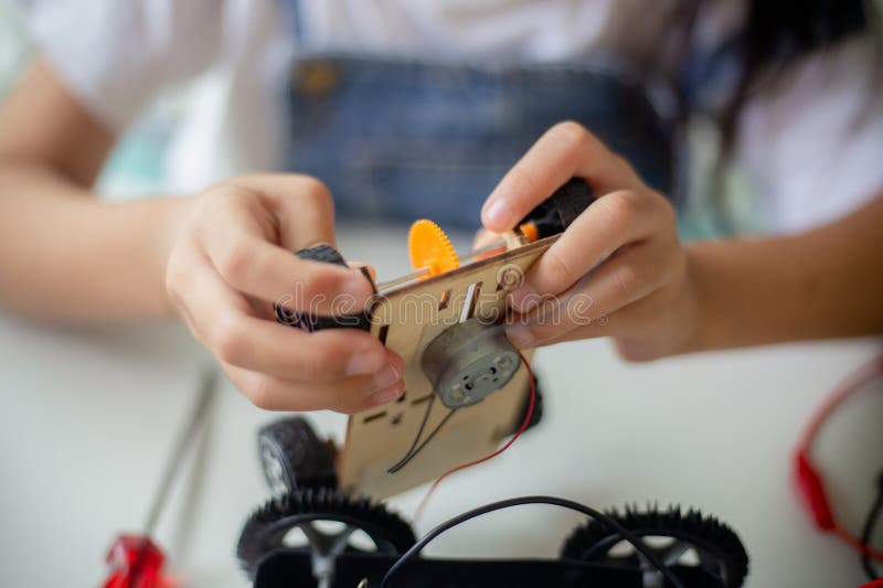 STEM Education Concept. Asian Young Girl Learning Robot Design Stock ...