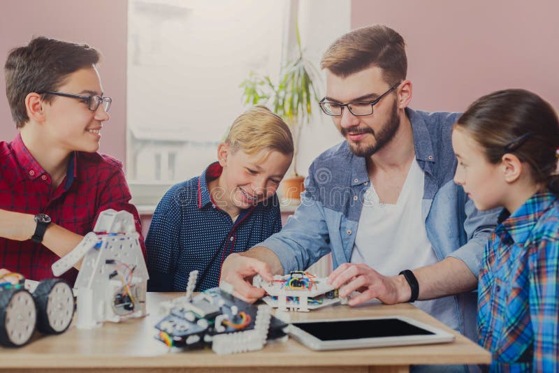 Stem Education. Kids Creating Robots with Teacher Stock Image - Image ... Stem Education. Kids Creating Robots with Teacher Stock Image - Image ...