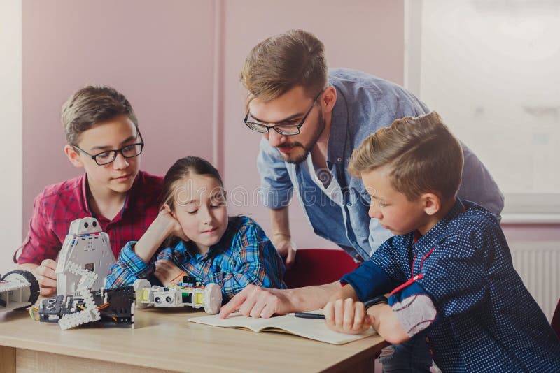 Stem Education. Kids Creating Robots with Teacher Stock Image - Image ... Stem Education. Kids Creating Robots with Teacher Stock Image - Image ...