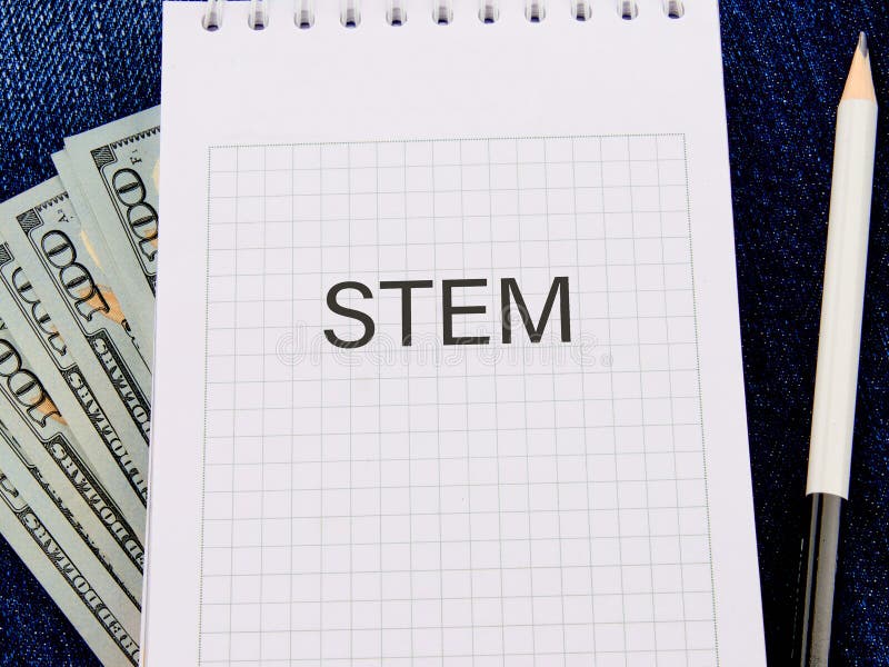 STEM Word and Symbols on a Piece of Paper on Dollar Bills Stock Photo ...