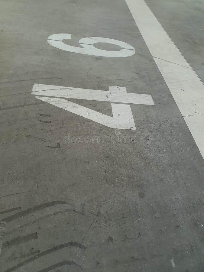 System and Direction on Concrete Garage Floor Stock Photo - Image of ...
