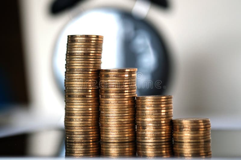 Step of Coins Stacks and Alarm Clock with Tablet Computer and Financial ...