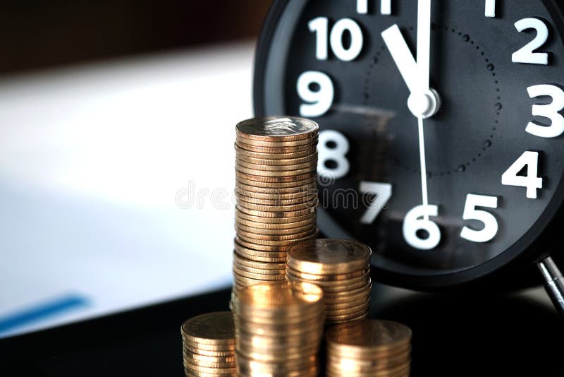 Step of Coins Stacks and Alarm Clock with Tablet Computer and Financial ...
