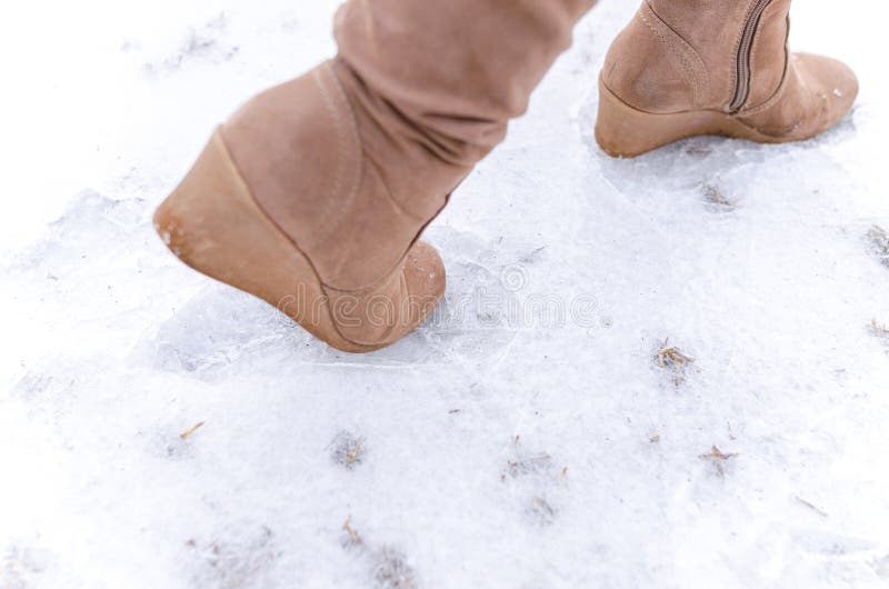 Step on frosted ground stock photo. Image of footwear - 98426900