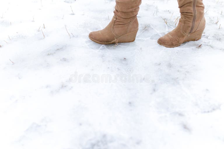 Step on frosted ground stock photo. Image of footwear - 98426900