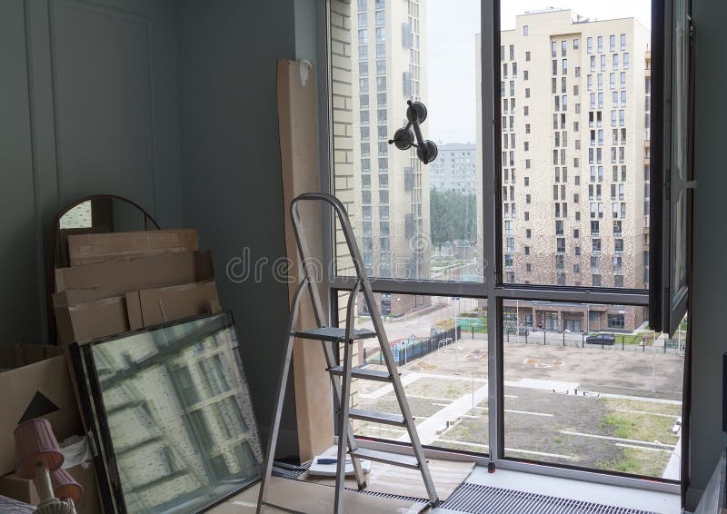 Step Ladder Near Disassembled Window and Removed Glass in Interior ...