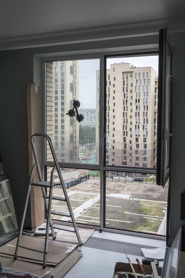 Step Ladder Near Disassembled Window and Removed Glass in Interior ...