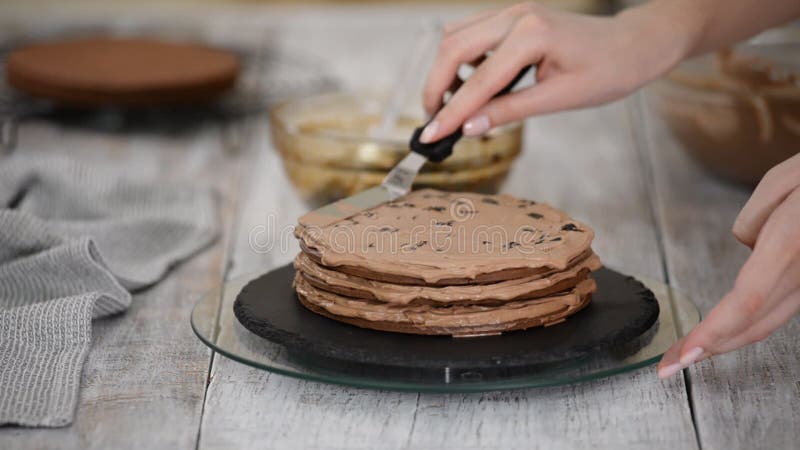 Step by Step. Pastry Chef Making Chocolate Layer Cake with Prune ...