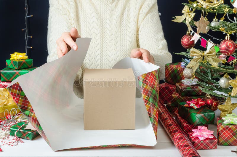Step-by-step Photo Instructions for Wrapping a Christmas Gift, Step 2 ...