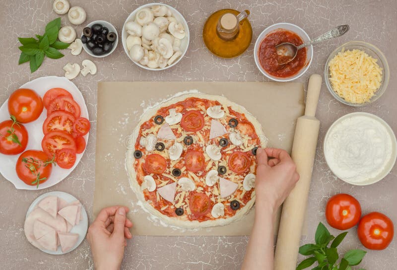 Step by Step Preparation of Homemade Pizza, Step 9 - Put Olives on ...