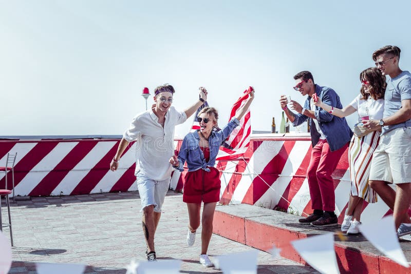 Cheerful Students Looking Forward at Modern Performance Stock Image ...