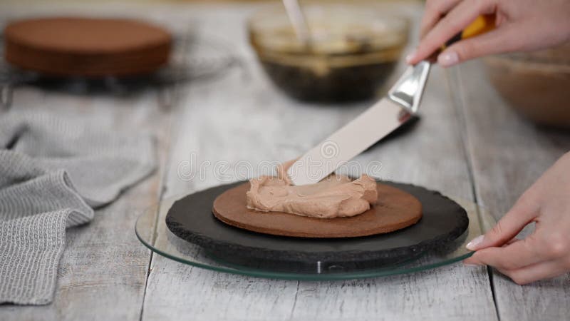 Step by Step. Pastry Chef Making Chocolate Layer Cake with Prune ...