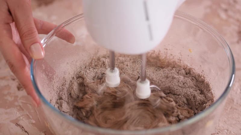 Step-by-step Process of Making a Chocolate Cake. Beat the Dough with ...