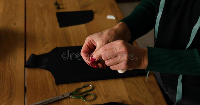 Step by Step, Woman Dressmaker Pulling Thread into the Needle Stock ...
