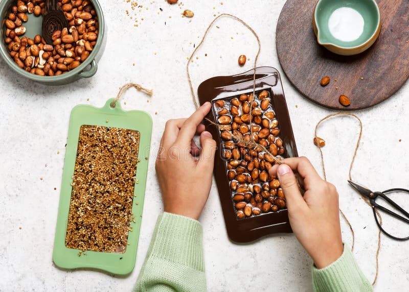 Step 3. Threading the Ribbon, String, or Twine in Each Chocolate Bars ...