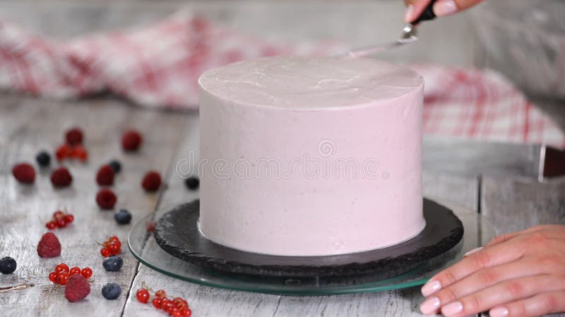Step by Step. Woman`s Hand Spreading Whipped Cream on Sponge Cake Stock ...
