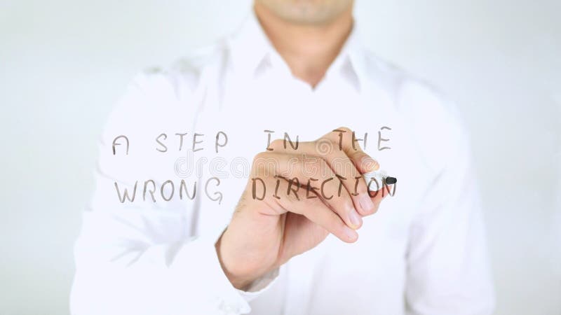 A Step in the Wrong Direction, Man Writing on Glass, Handwritten Stock ...