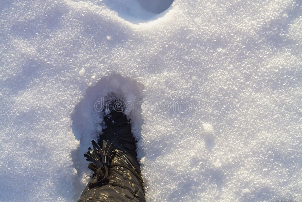 Step with Your Foot in a Warm Black Boot in Deep Snow in Winter Stock ...