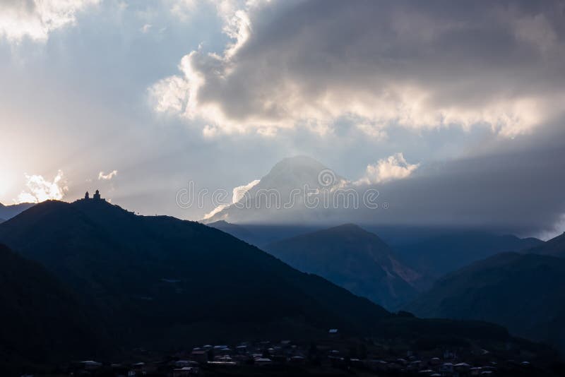 Stepantsminda - Distant View on Gergeti Trinity Church in Stepansminda ...