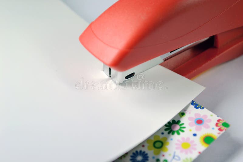 Stepler fasten paper stock image. Image of child, stepler - 37241263