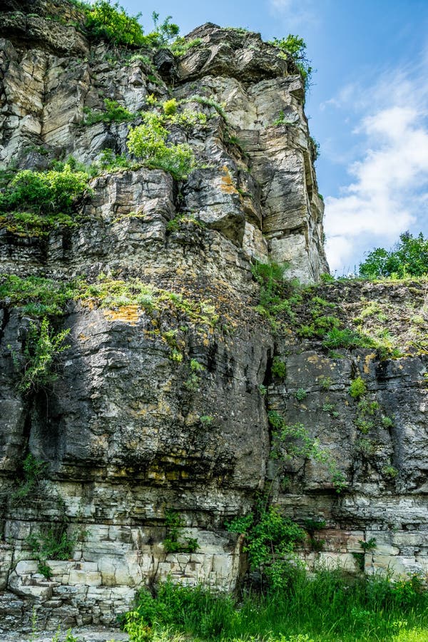 Stepped moss covered cliff stock photo. Image of wall - 148459128
