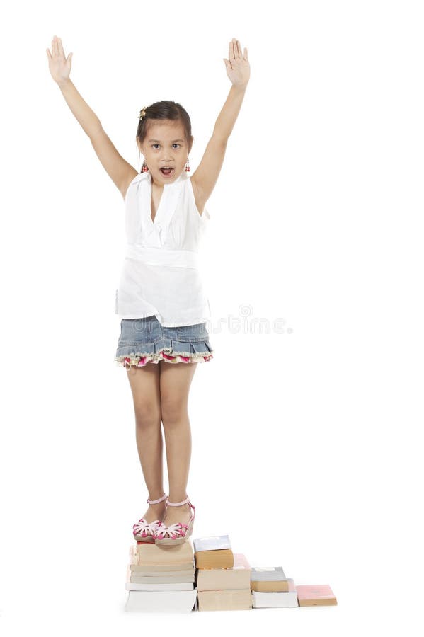 Stepping on books stock photo. Image of stack, girl, stacks - 3558946