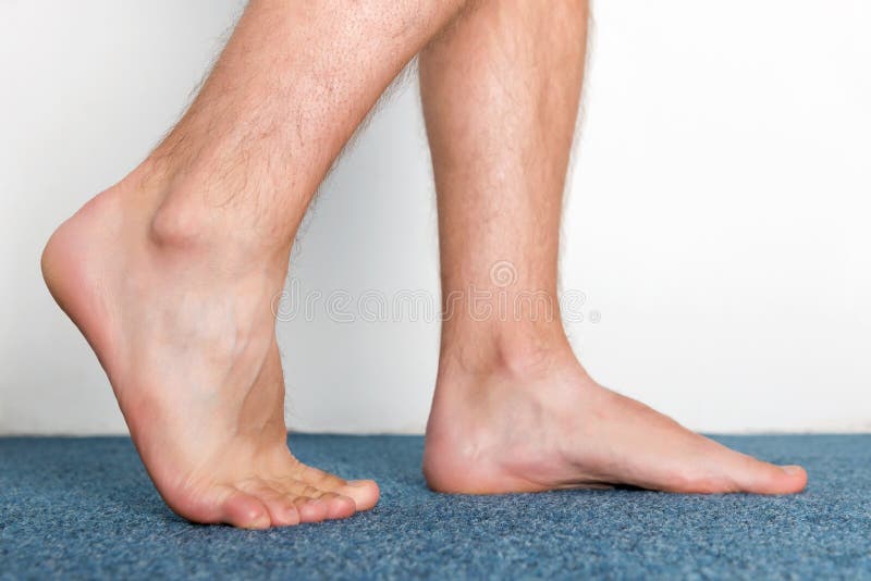 Stepping male feet stock photo. Image of foot, podiatric - 60424042