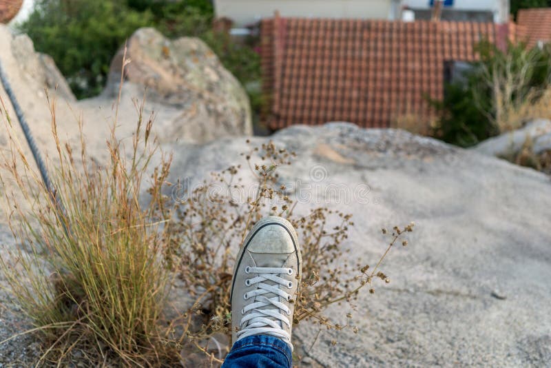 Stepping off a cliff ledge stock image. Image of danger - 35389617