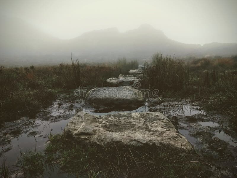 Stepping Stones into the Mist - Ben a`an, Scotland Stock Image - Image ...