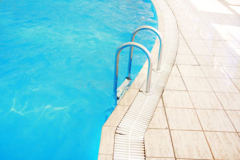 Steps in a blue water pool stock photo. Image of rest - 43464268