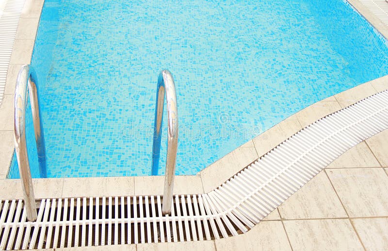Steps in a blue water pool stock photo. Image of outdoors - 45957820