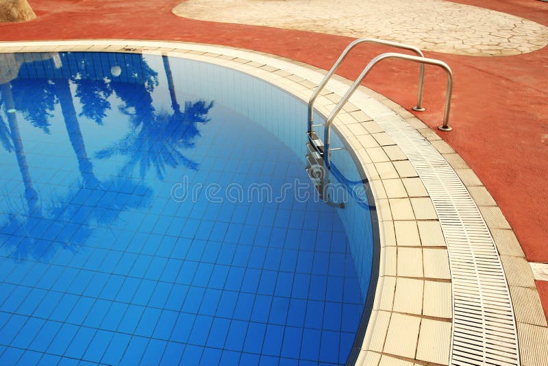 Steps in blue water pool stock image. Image of activity - 56310769