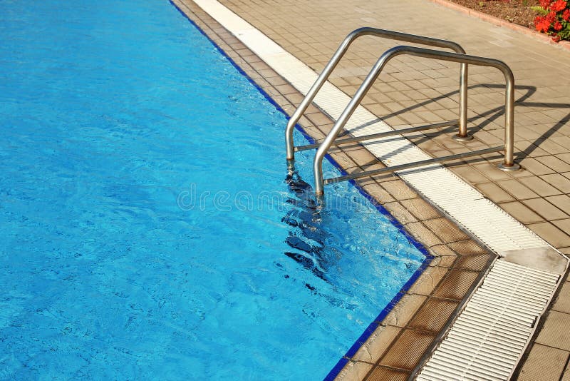Steps in blue water pool stock image. Image of horizontal - 56603761