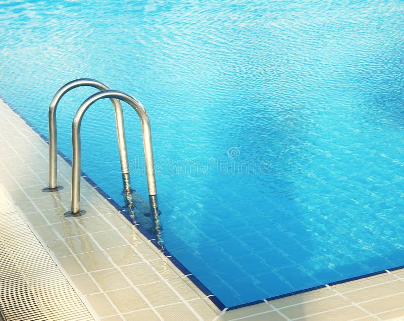 Steps in blue water pool stock image. Image of entrance - 74194257