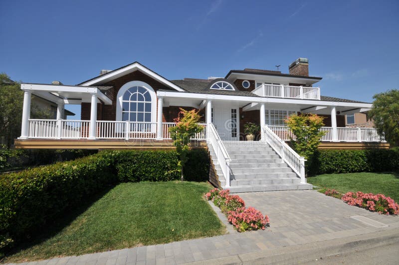 Steps Lead To a House with Pillars and Railings Stock Photo - Image of ...