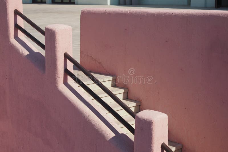 Steps Leading To an Elevated Area with Pink Wall Design Stock Photo ...